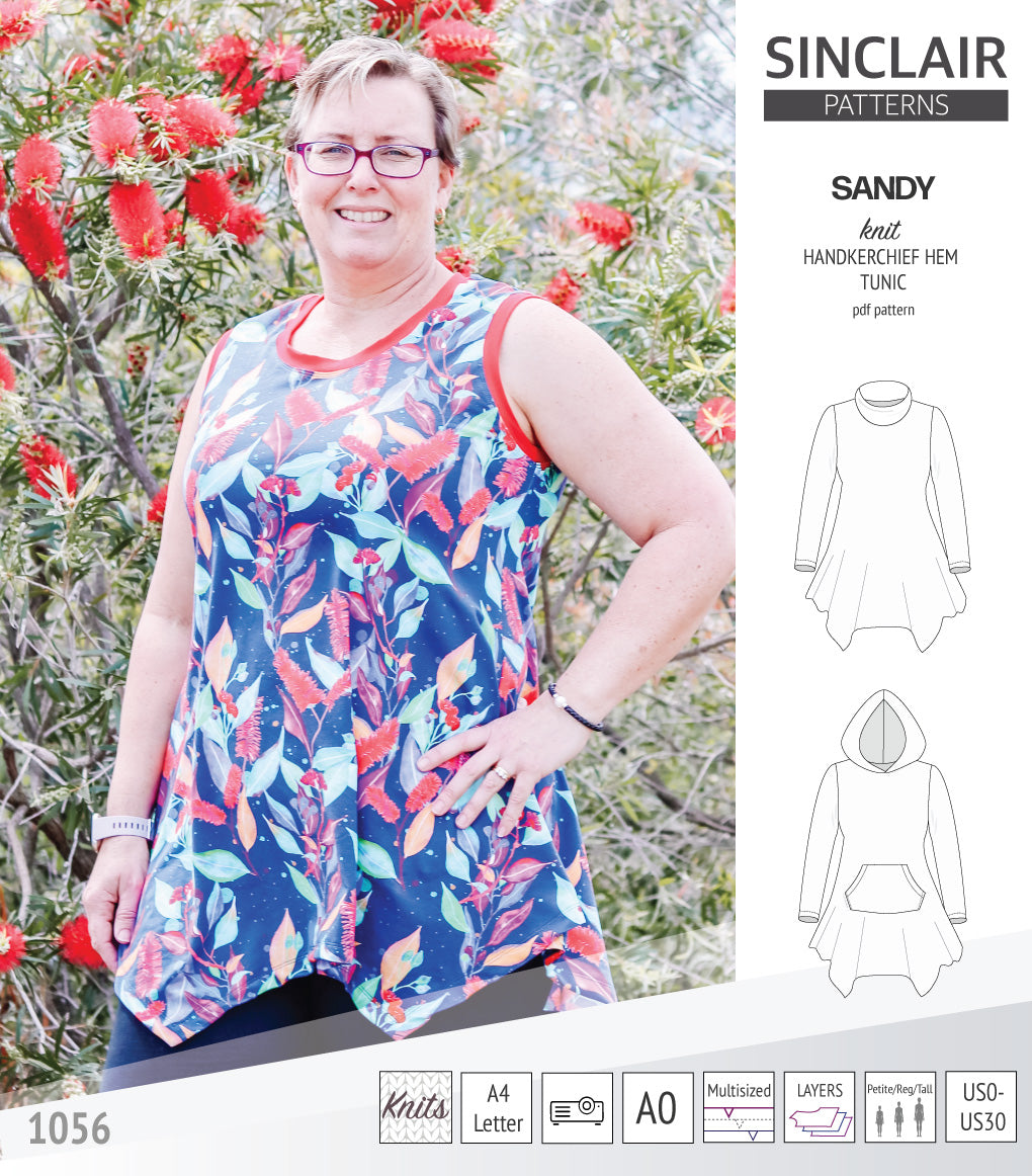 Sandy knit handkerchief hem tunic with a cowl, collar, hood and pockets ...