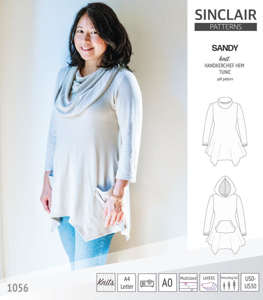 Sandy knit handkerchief hem tunic with a cowl, collar, hood and pockets ...