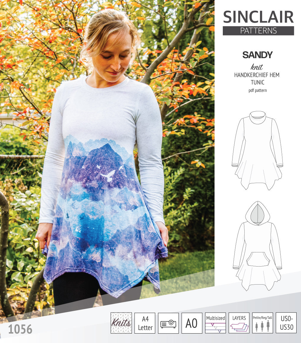 Sandy knit handkerchief hem tunic with a cowl, collar, hood and pockets ...